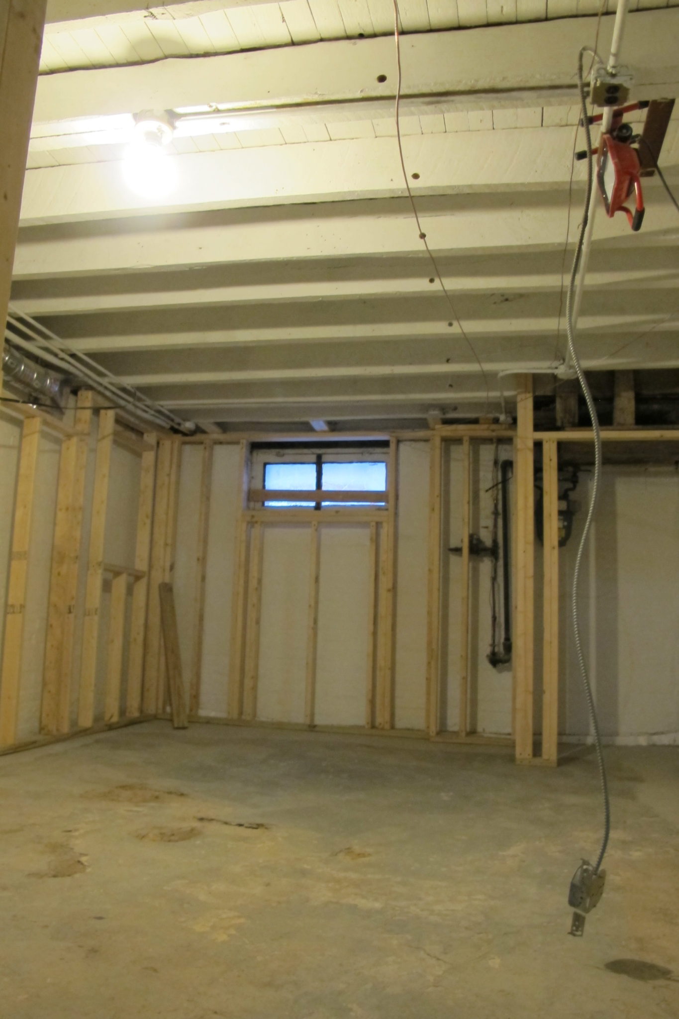 Framing & Lighting for a Bright & Beautiful Basement Renovation